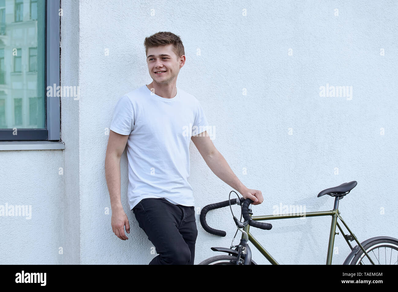 Man posing with cycle hi-res stock photography and images - Alamy