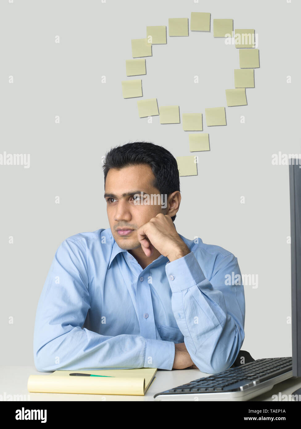 CORPORATE EXECUTIVE THINKING WITH THOUGHT BLURBS IN THE BACKGROUND ...