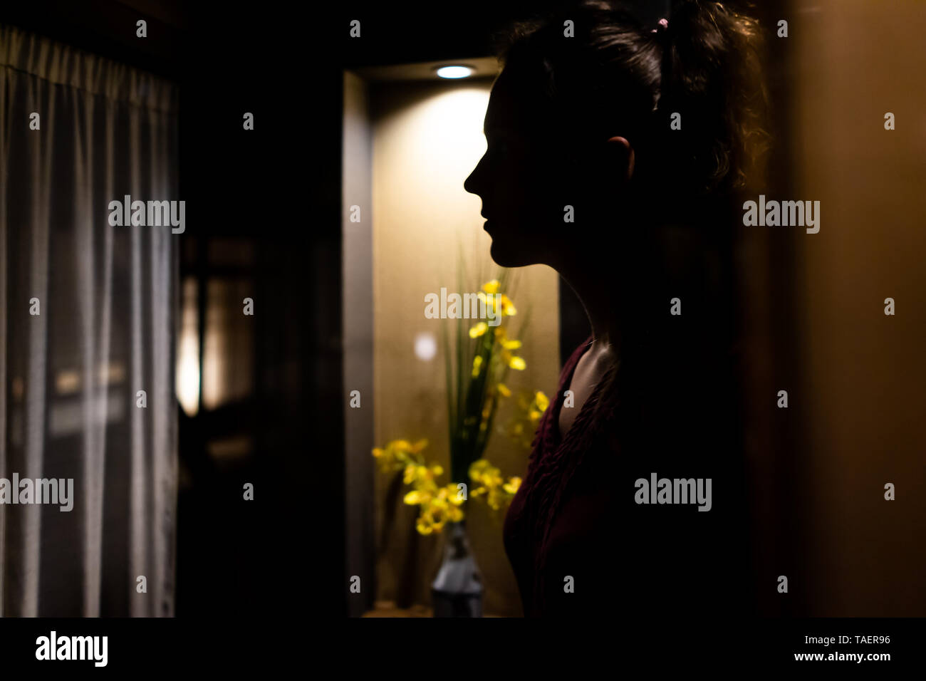 Girl in hotel corridor hi-res stock photography and images - Alamy