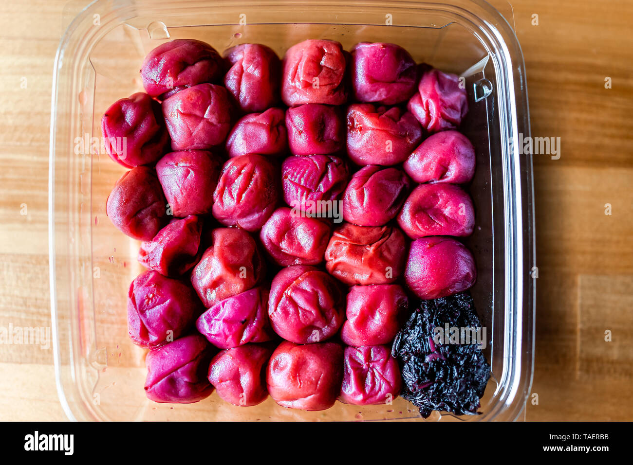 Traditional japanese storebought red umeboshi pickles made with ume ...