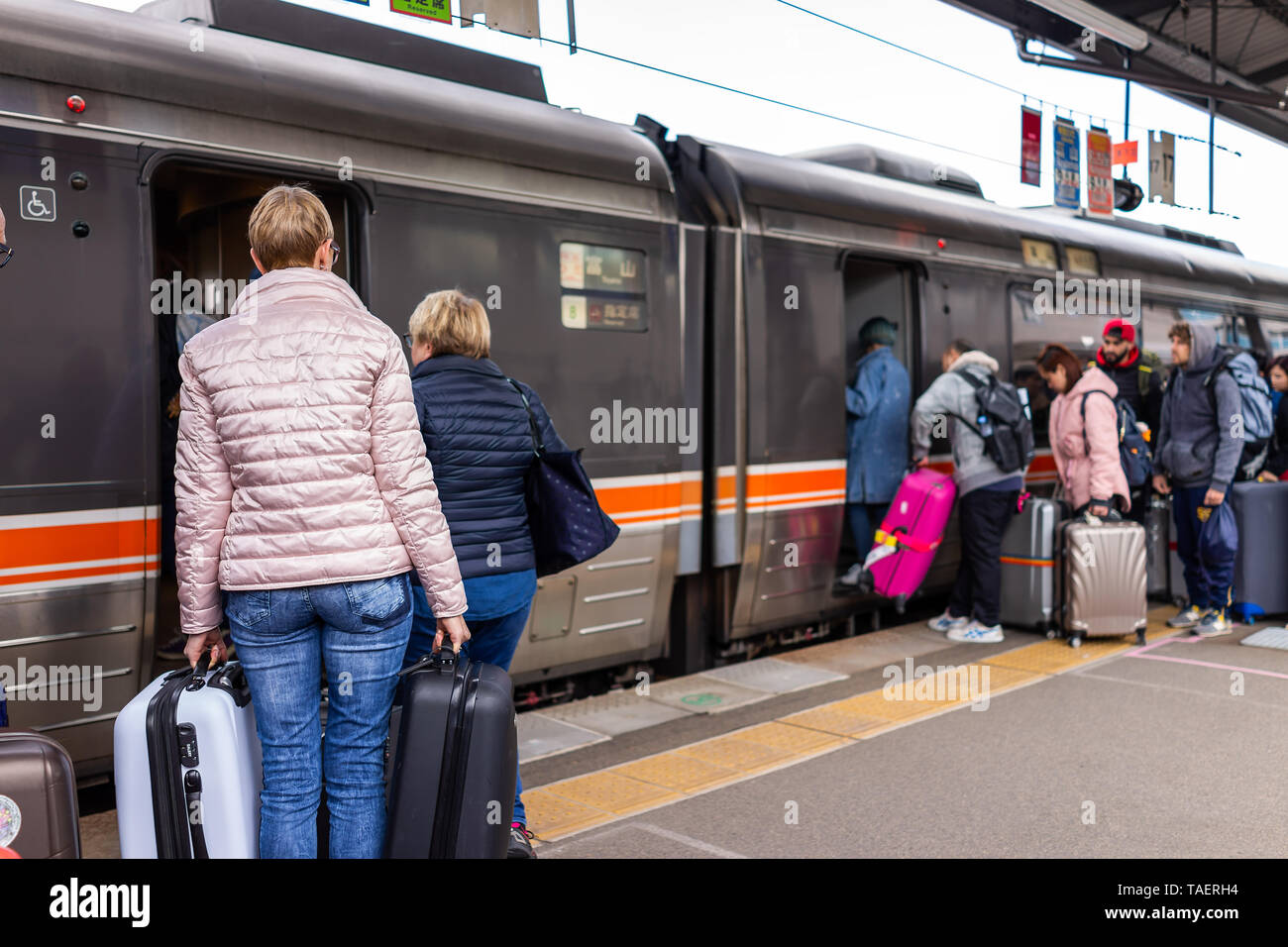 Takayama, Japan - April 8, 2019: JR station platform with people ...
