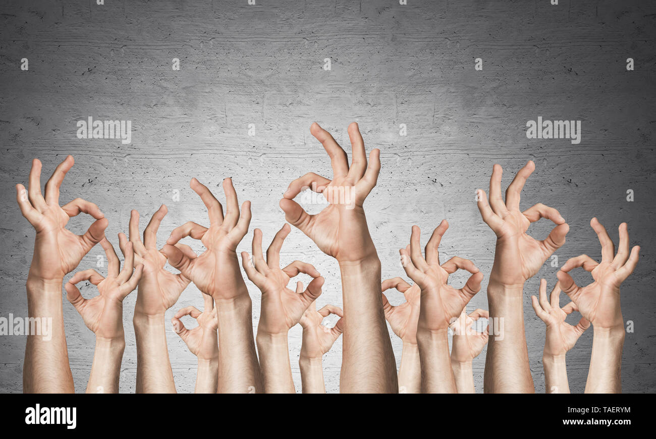 Row of man hands showing okay gesture Stock Photo - Alamy