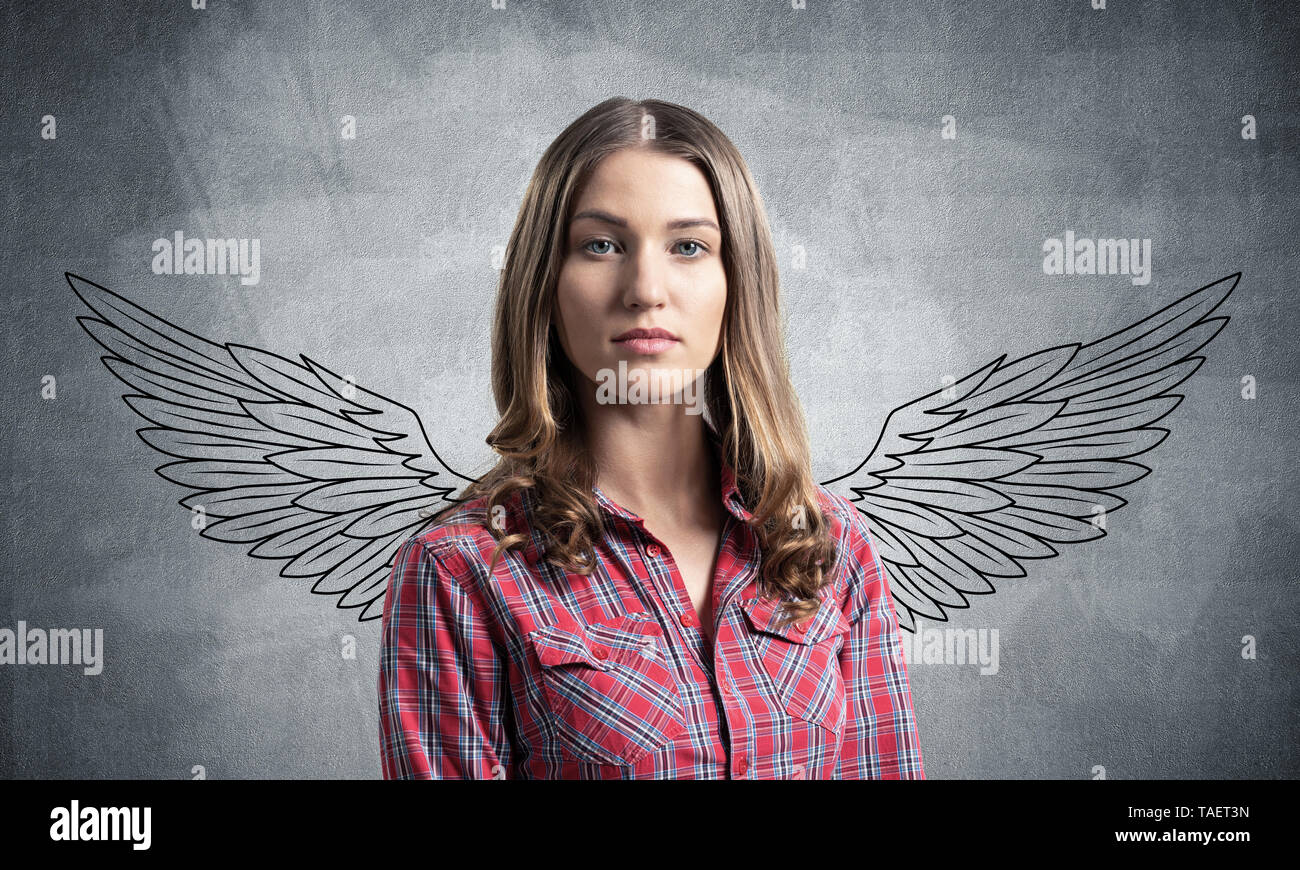 Young woman having serious and calm face Stock Photo - Alamy