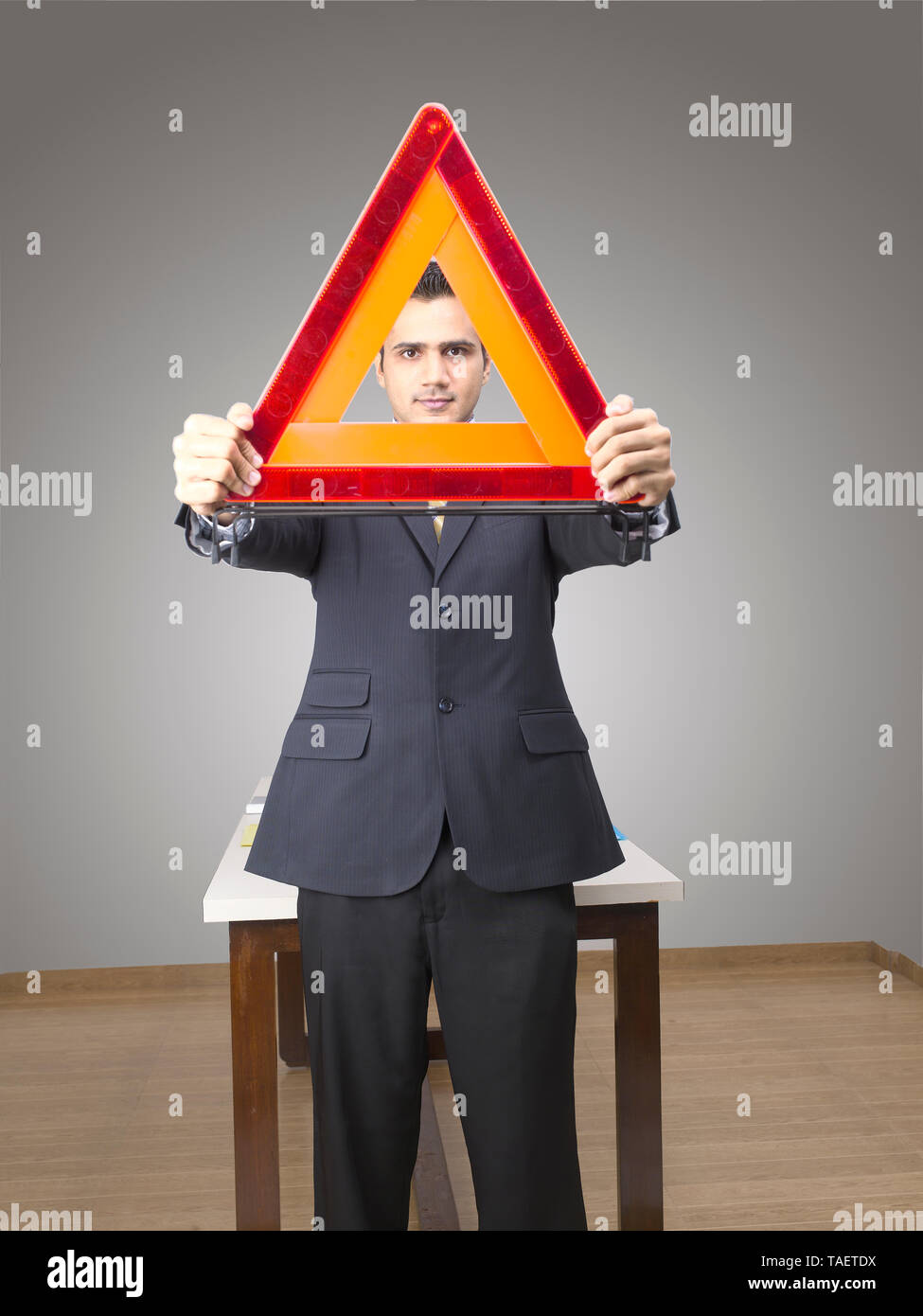 ONE MAN HOLDING DISTRESS SIGN Stock Photo - Alamy
