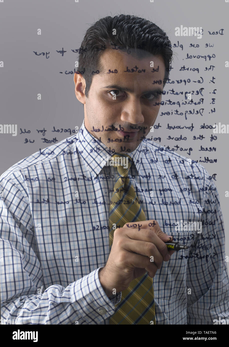 CORPORATE EXECUTIVE WRITING A FLOW CHART/PROCESS Stock Photo - Alamy