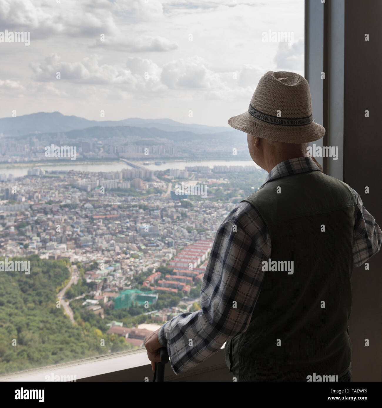 Tourist looking through window from Seoul Tower, Namsan Park, Namsan ...