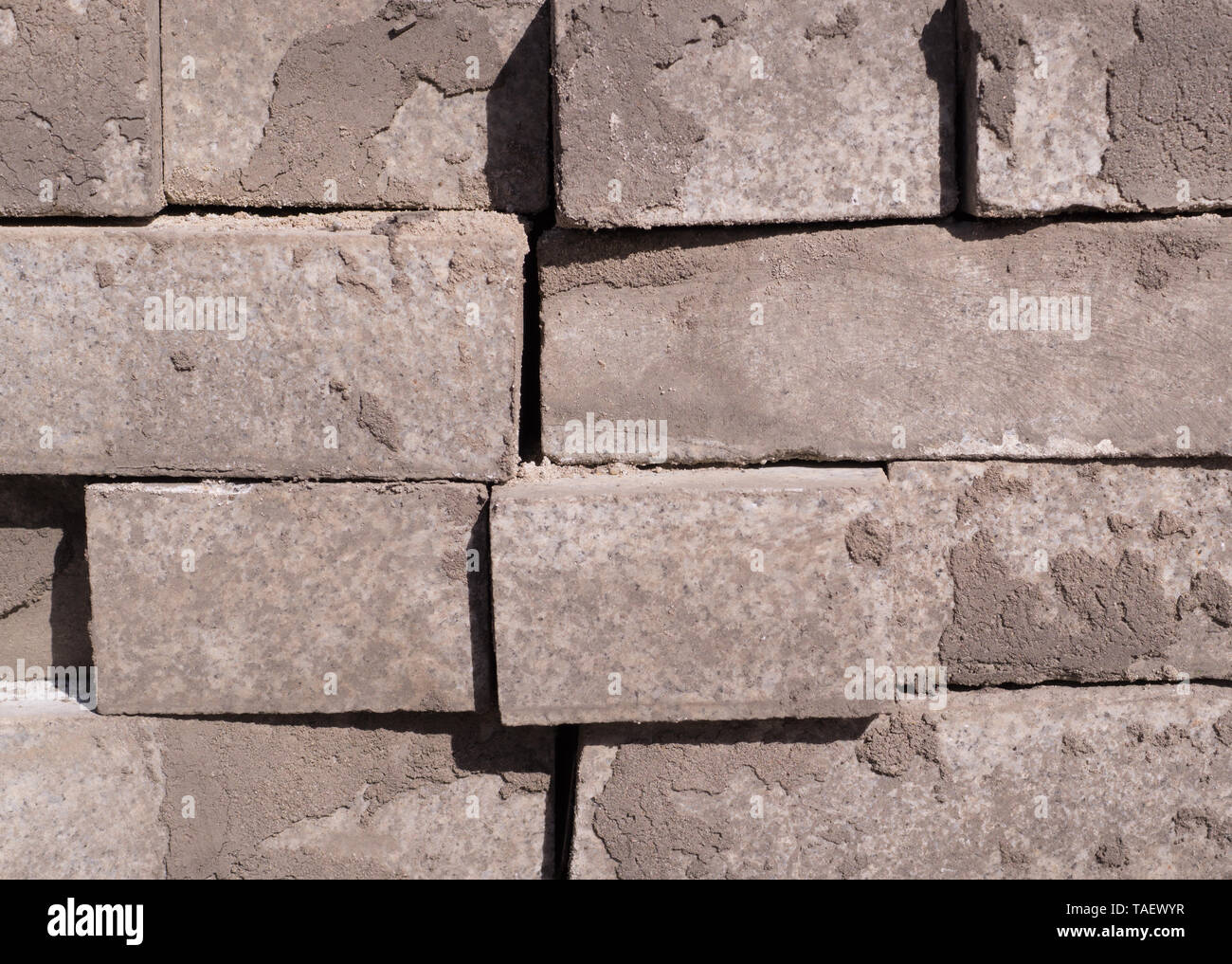 stack of gray pavement cobblestones, bricks. texture, construction ...