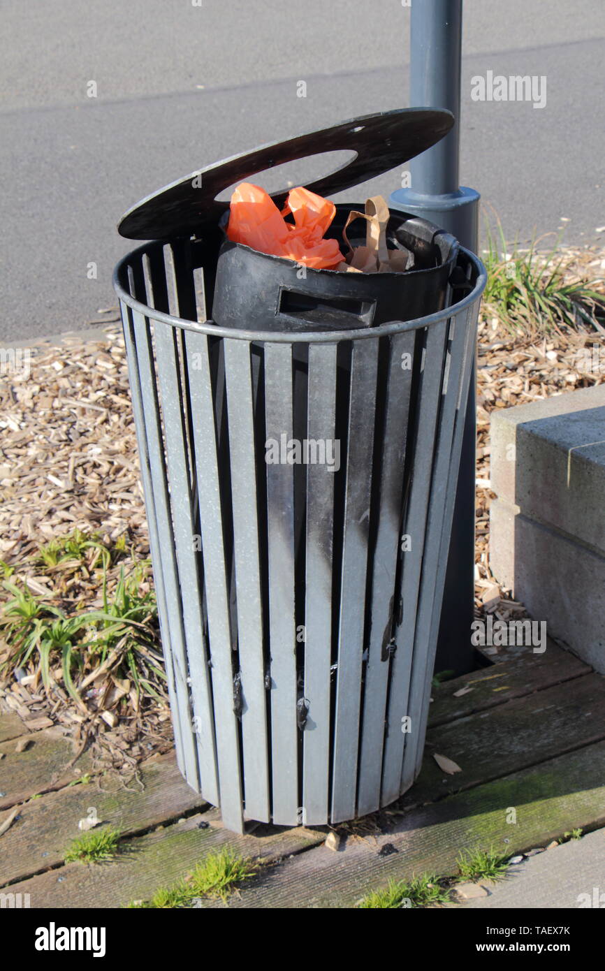 Full trash can hi-res stock photography and images - Alamy