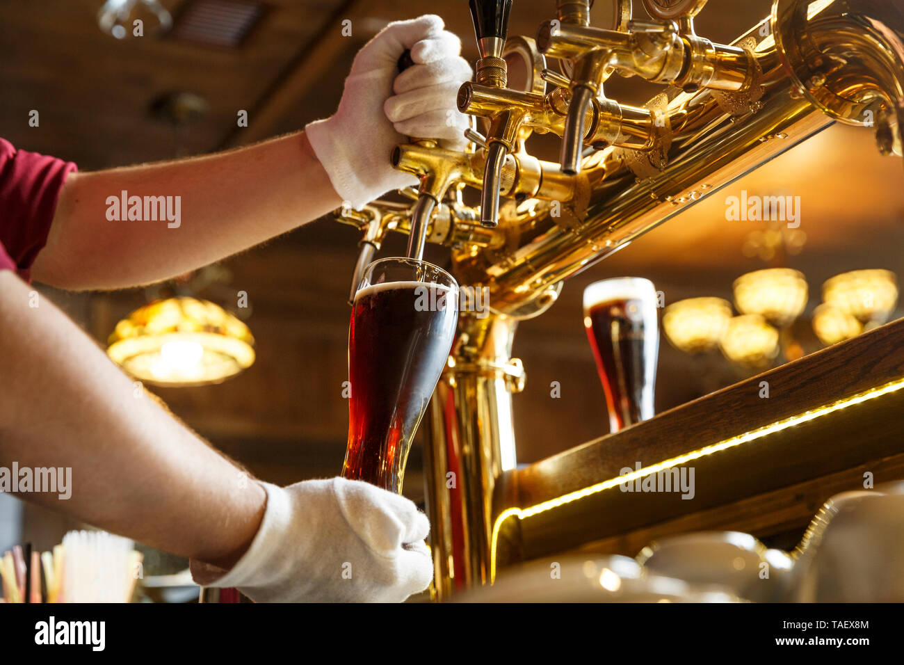 Pouring fresh beer in glass hi-res stock photography and images - Alamy