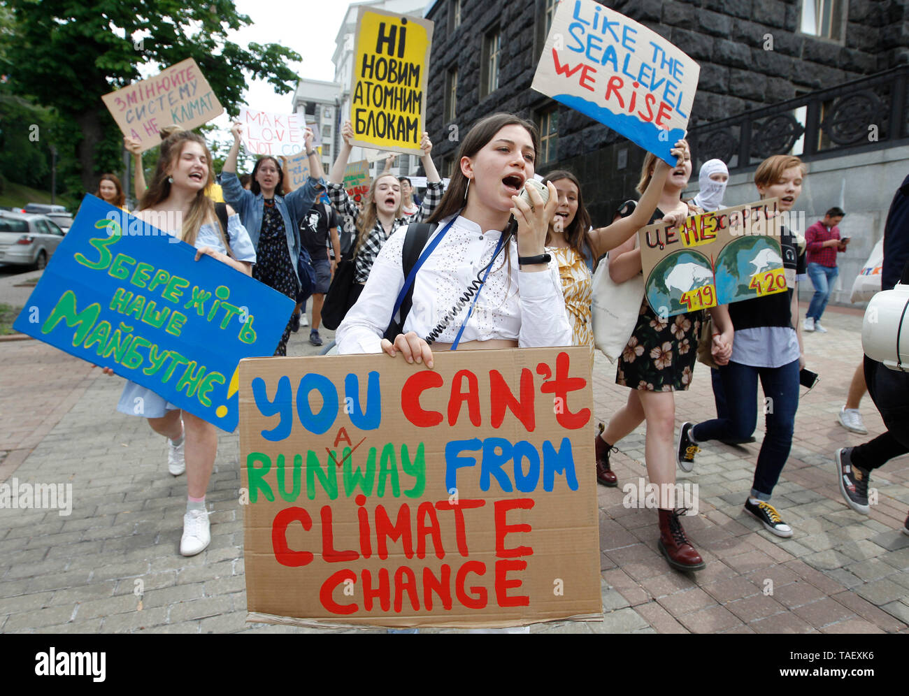 Climate change slogans hi-res stock photography and images - Alamy
