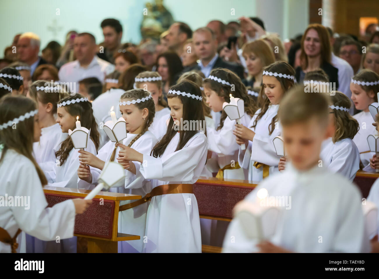 Group of girls dressed for first communion hi-res stock photography and ...