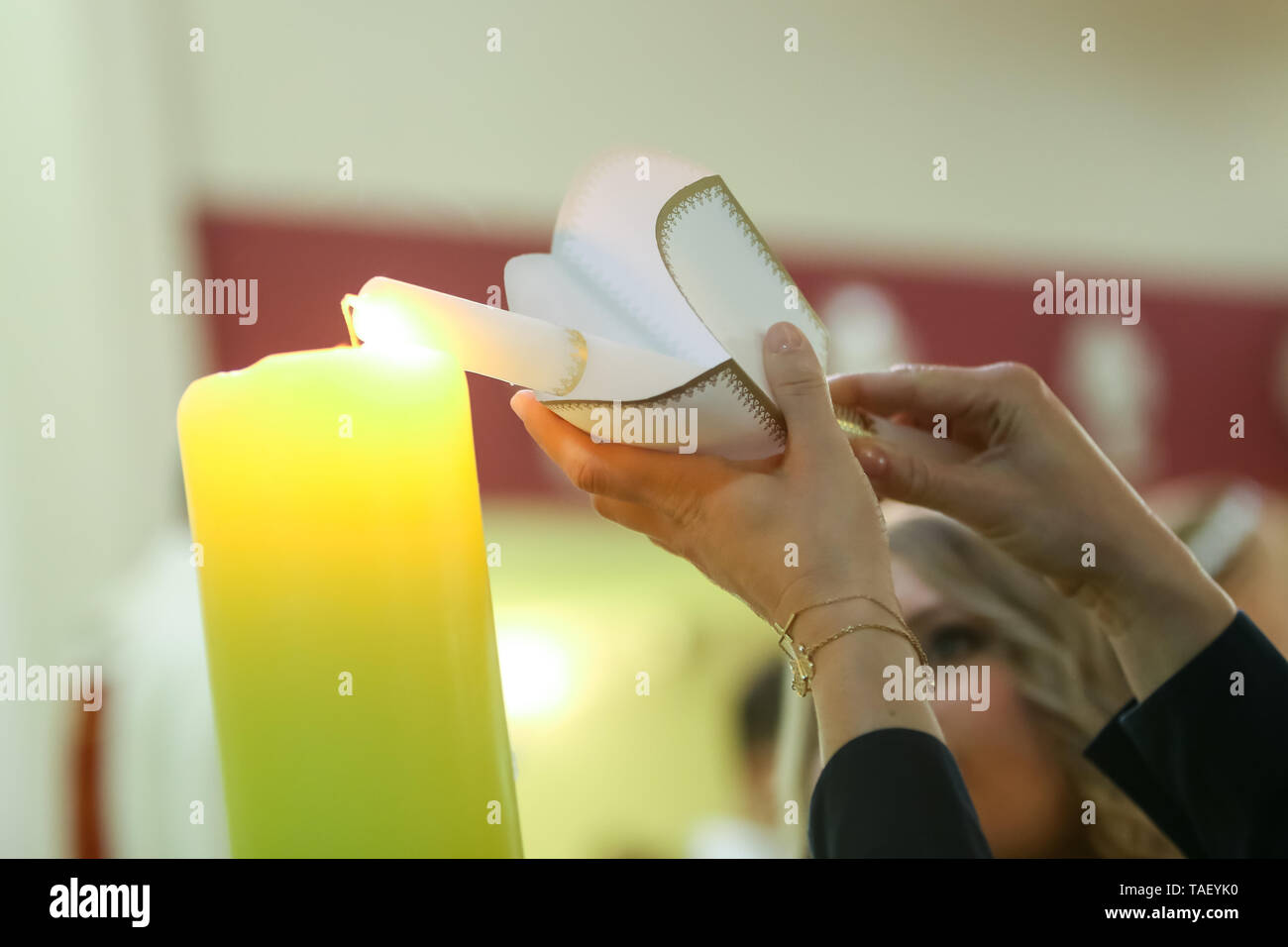 Zagreb, Croatia - May 11, 2019 : Detail of a woman lighting up the ...