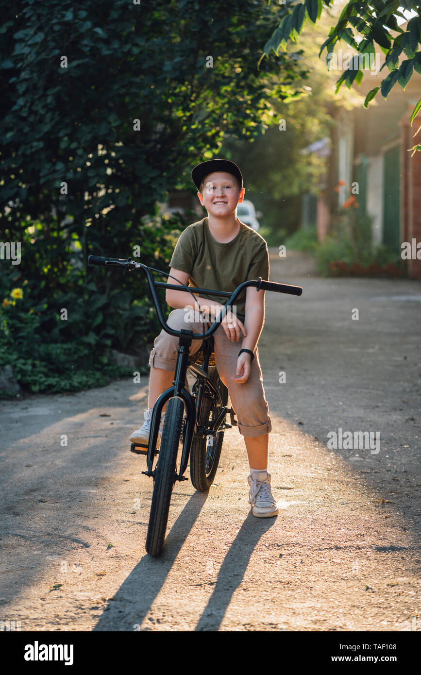 Boy on bike hi-res stock photography and images - Alamy