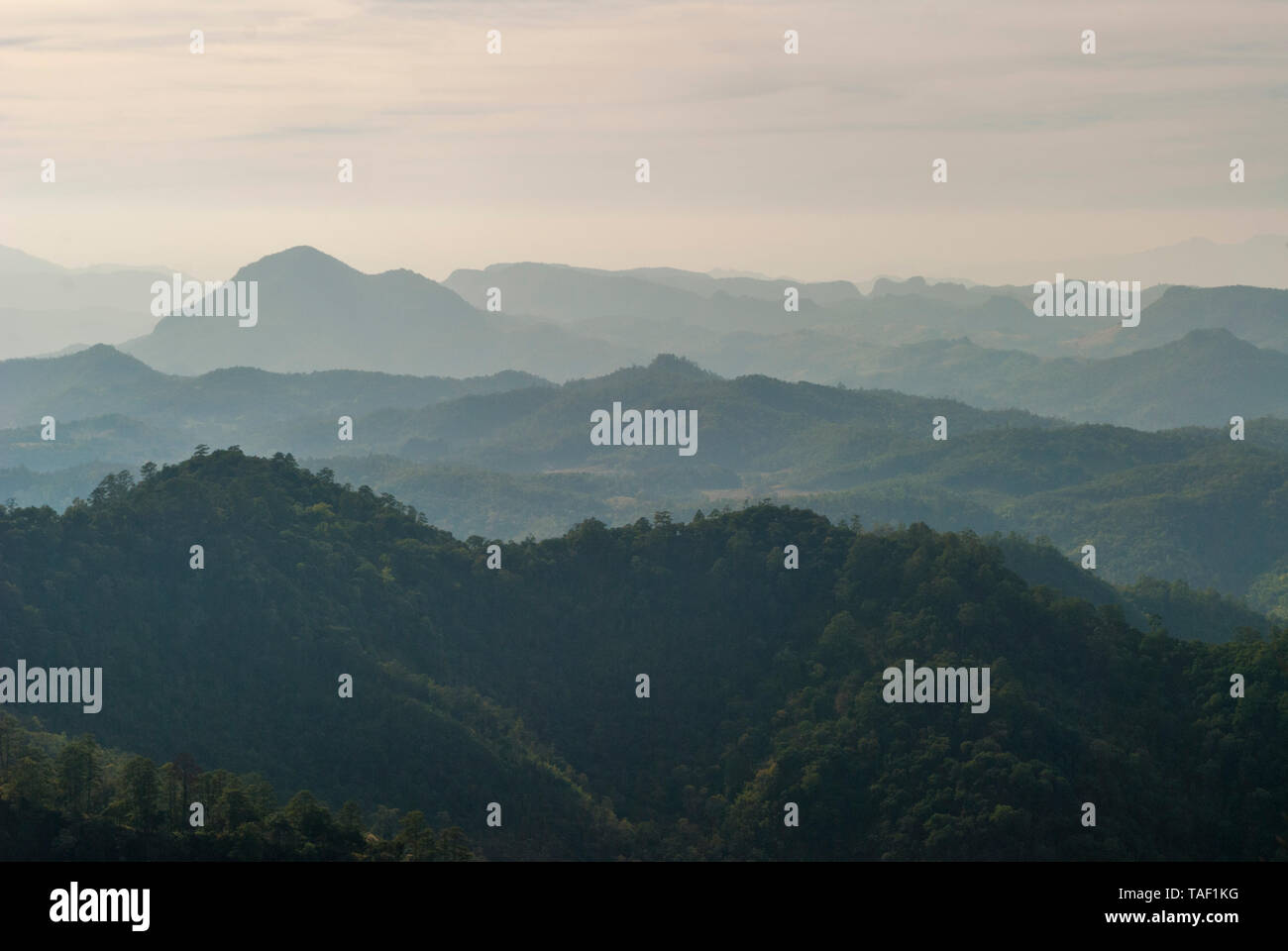 Scenery of landscape of hills covered with in a hazy day around Pai ...