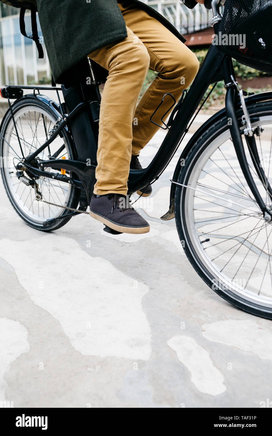 Man riding an e bike hi-res stock photography and images - Alamy