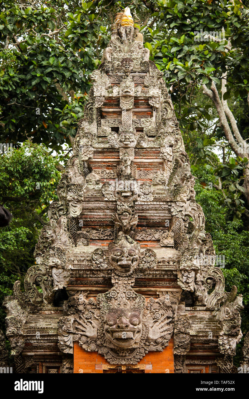 Stone face sculpture building wall at Bali Indonesia Stock Photo - Alamy