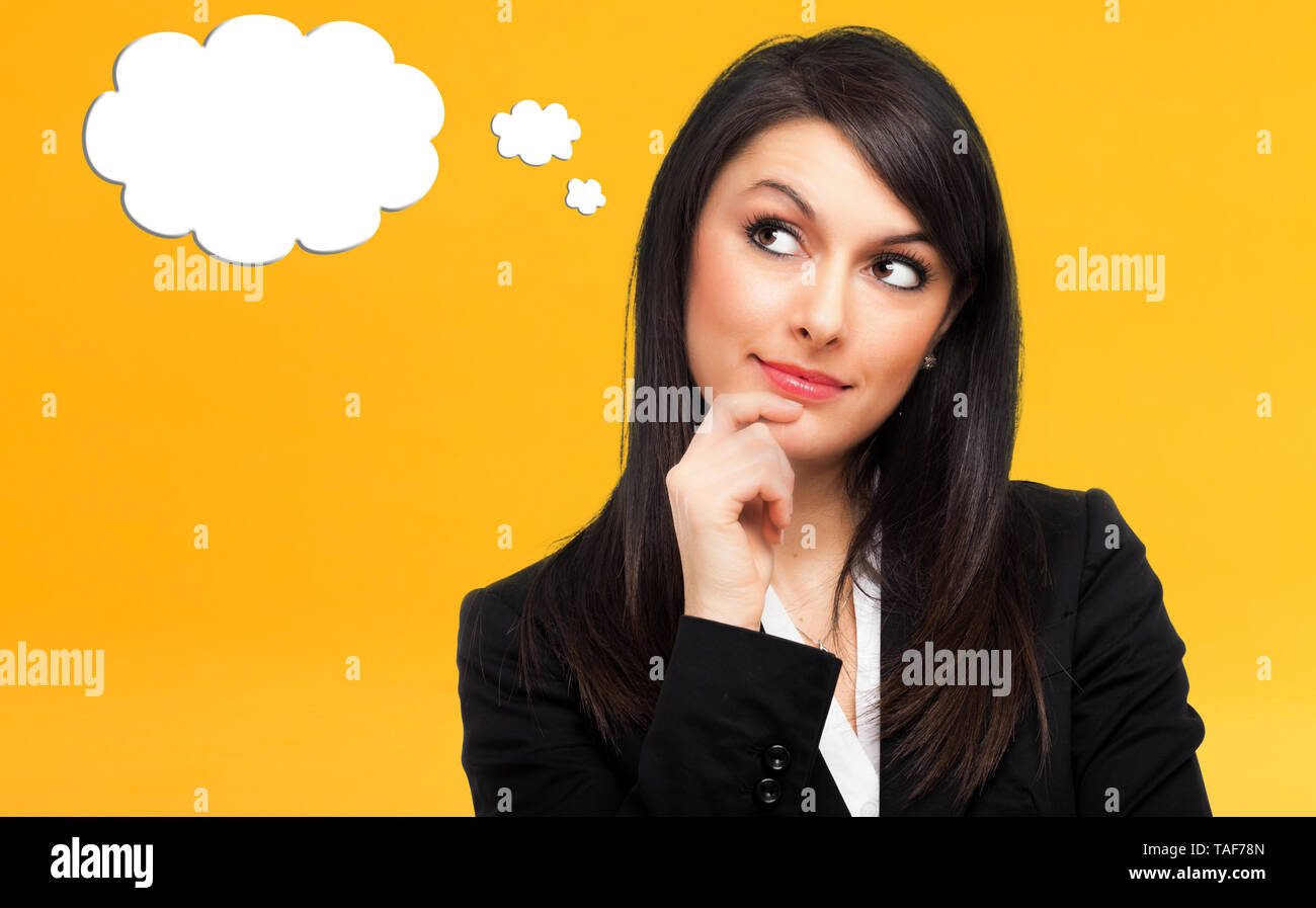 Beautiful young woman in a pensive expression Stock Photo - Alamy
