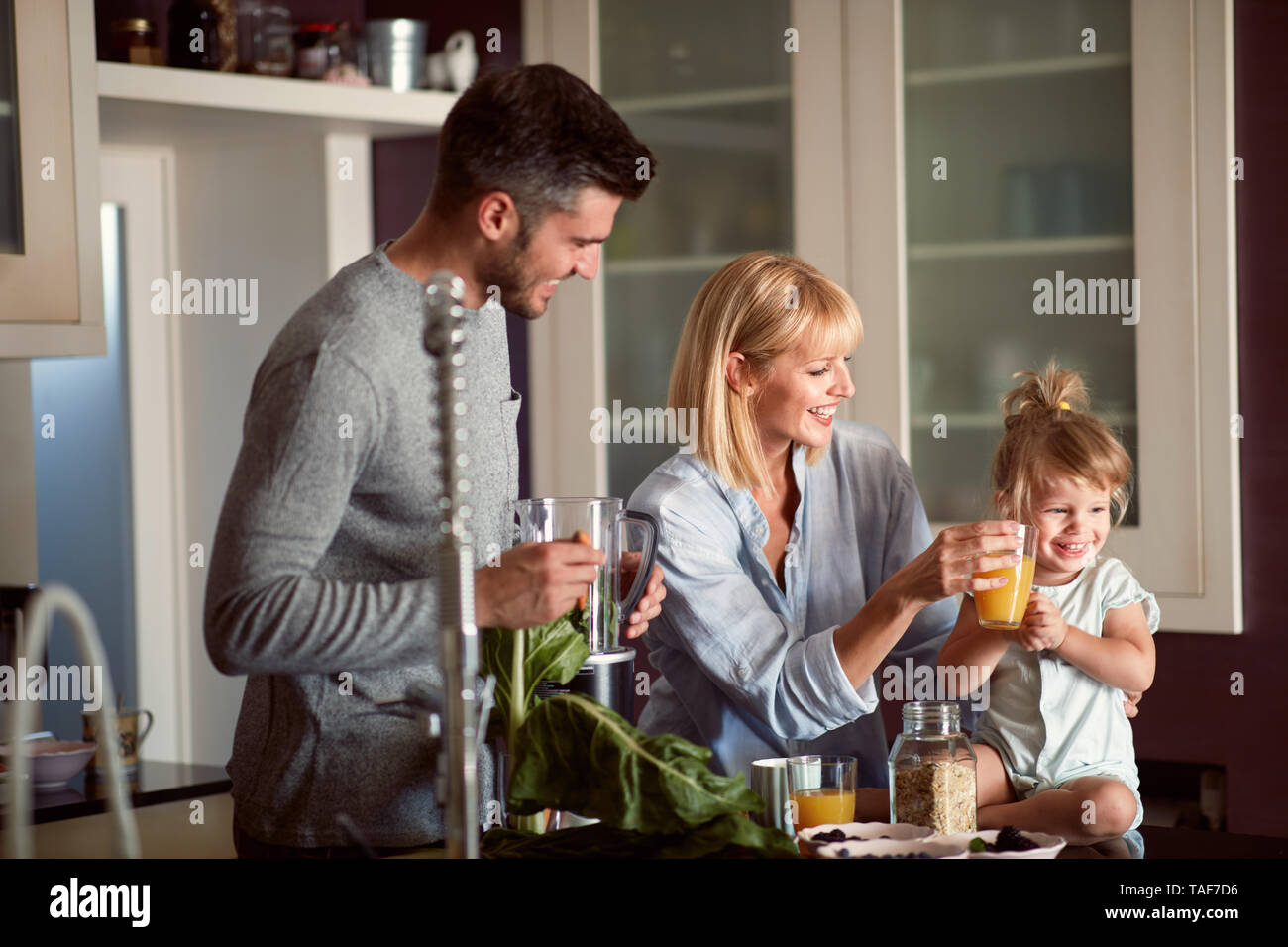 Morning in happy family with cute child Stock Photo - Alamy