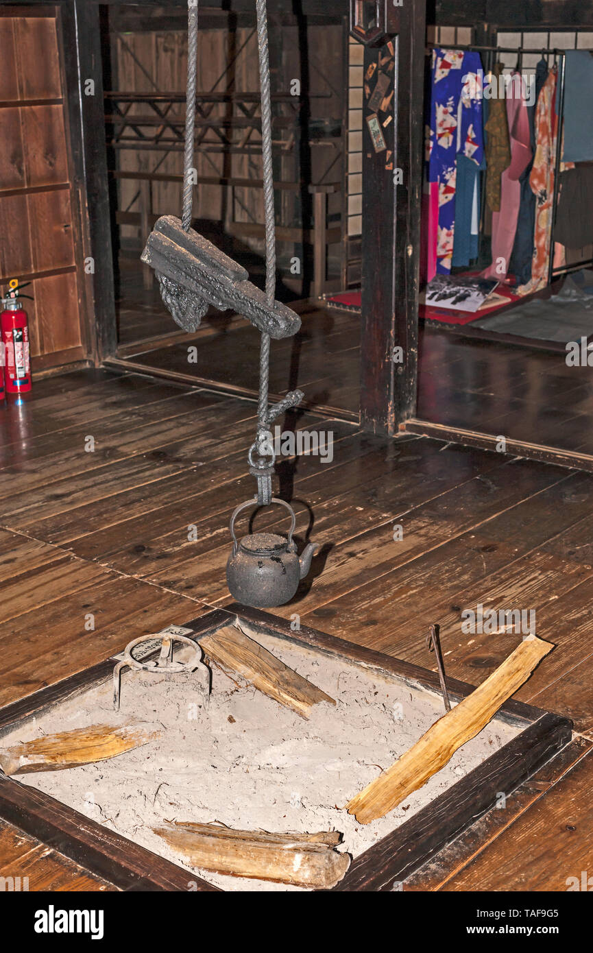 Traditional open hearth in room of a Gassho-zukuri house, Hida Minzoku ...