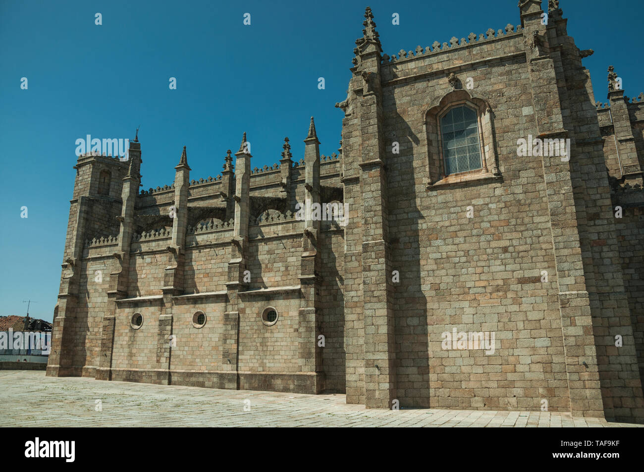 Stone bricks wall with buttresses and pinnacles decoration on the ...