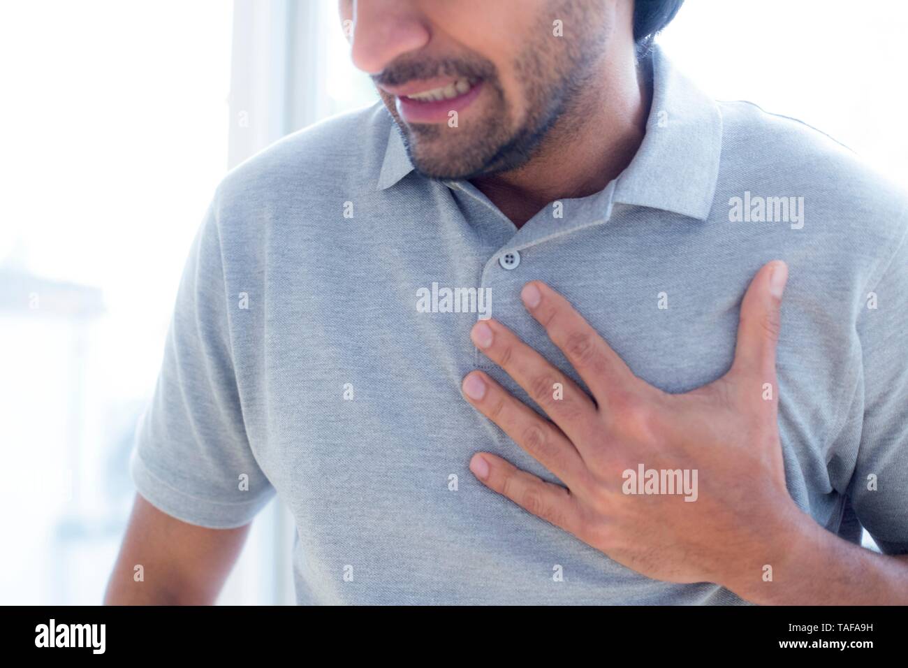 Chest Pain And Man High Resolution Stock Photography and Images - Alamy