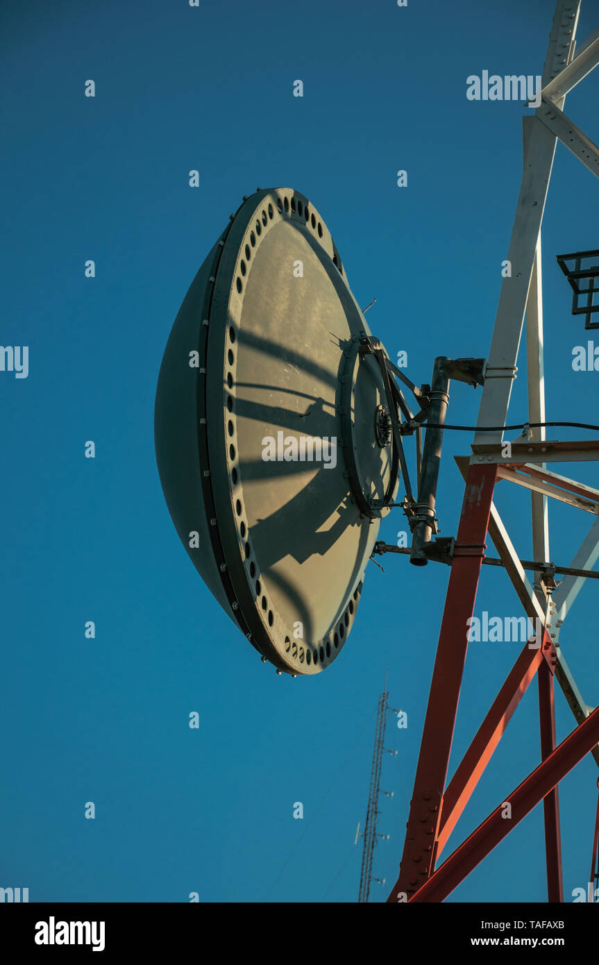 Antenna dish in a telecommunication cellular tower on base transceiver ...