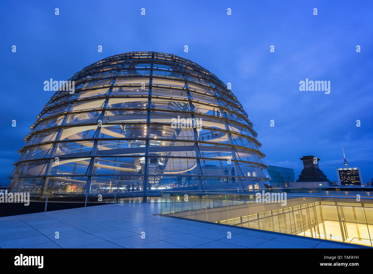 Illuminated glass dome on top of the Reichstag (German parliament ...