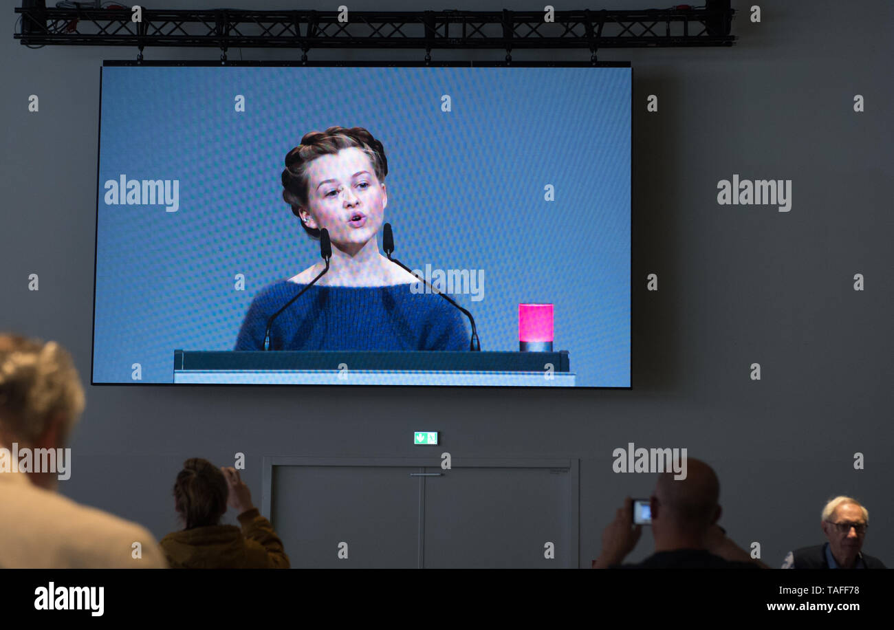 Feature - View of a video screen in the presentation hall and speaker ...