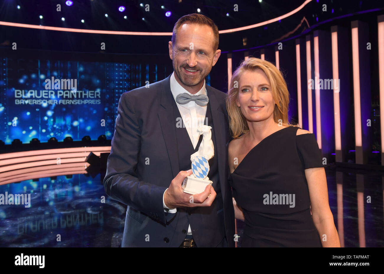 Munich, Germany. 24th May, 2019. Media manager Marcus Ammon and actress ...