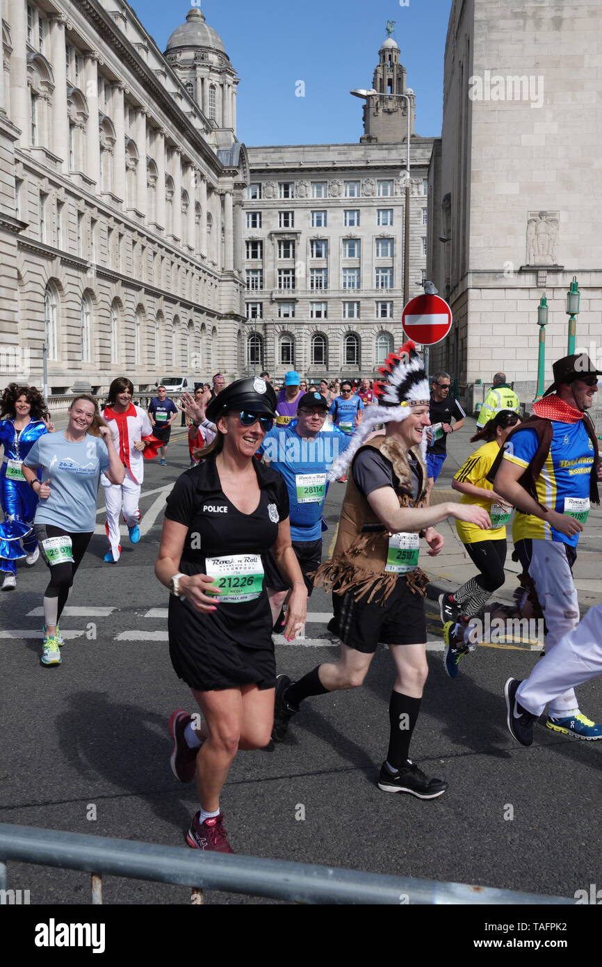 Liverpool UK, 25th May 2019. Runners taking part in the Rock n Roll ...