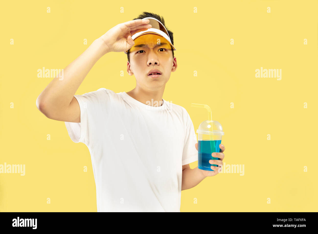 Neon yellow cap hi-res stock photography and images - Alamy