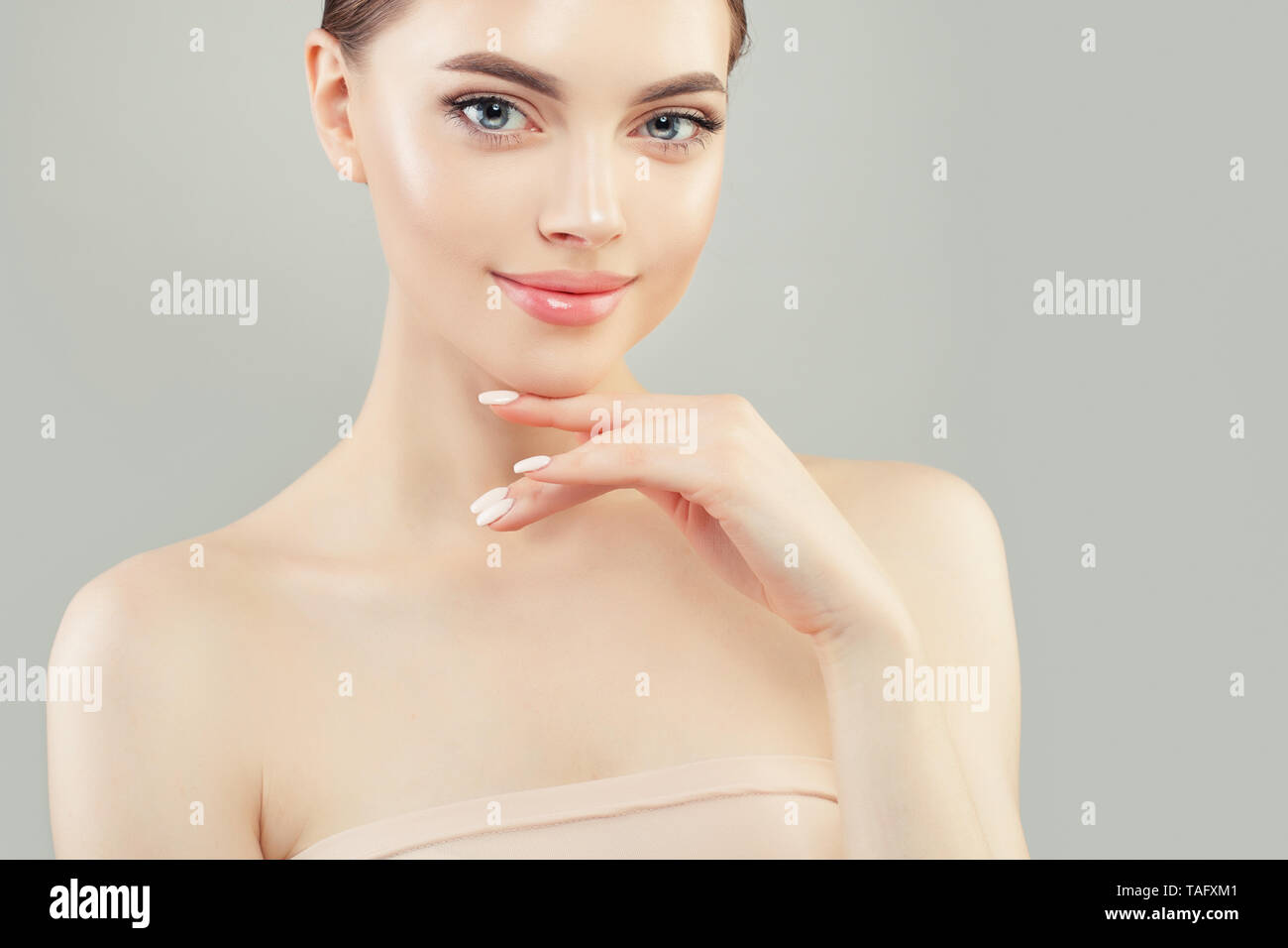 Pretty woman with clear skin closeup Stock Photo - Alamy