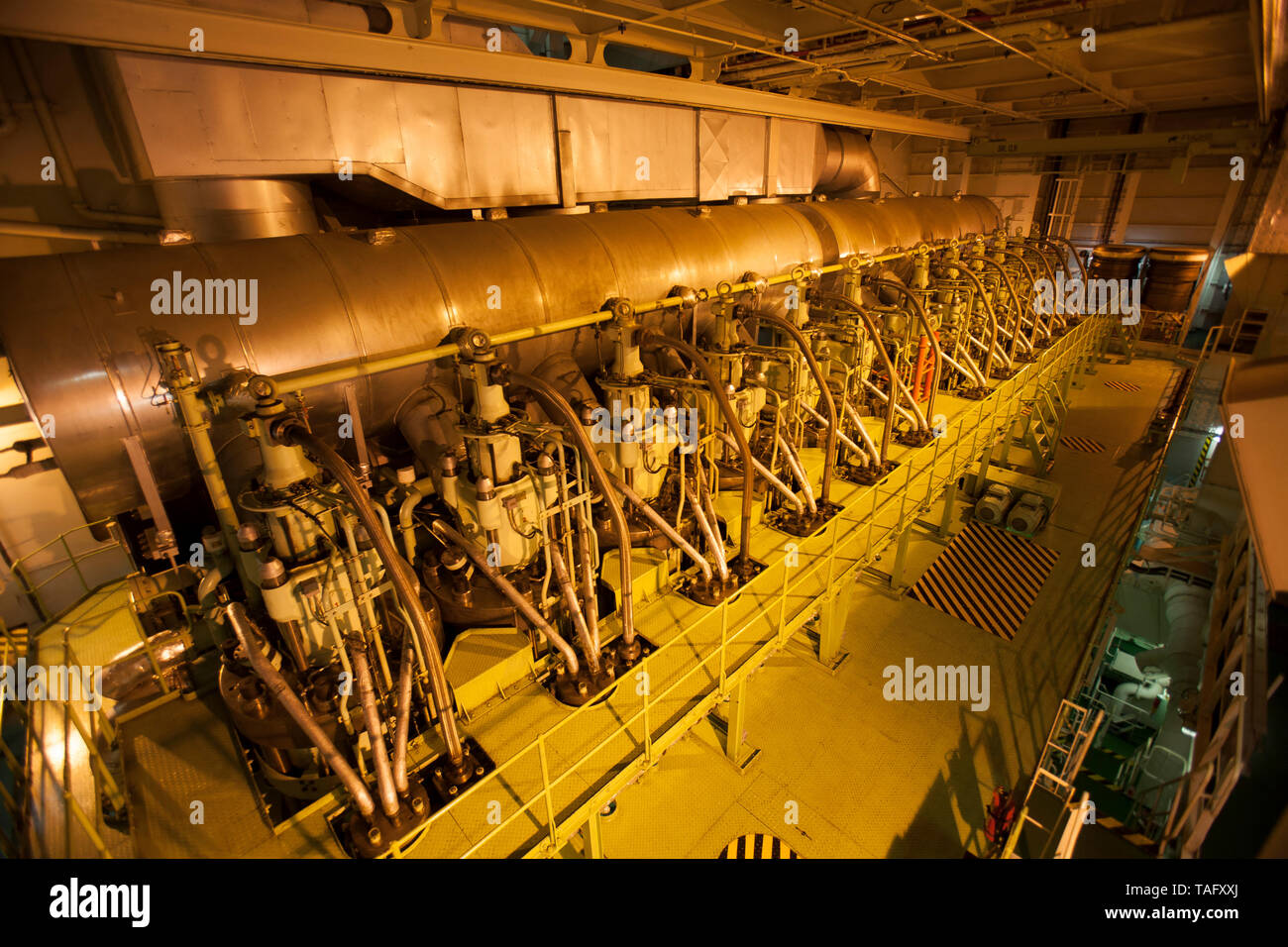 Engine of a container carrier 350 m long Stock Photo - Alamy