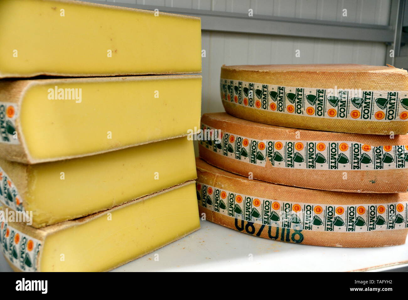 Comte cheese making, Cheese cut, Cheese factory, Damprichard, Doubs ...