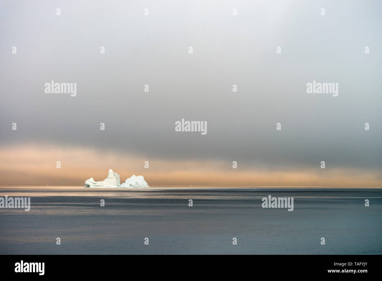 Iceberg drifting at sunrise in Disko Bay, Greenland Stock Photo - Alamy Iceberg drifting at sunrise in Disko Bay, Greenland Stock Photo - Alamy
