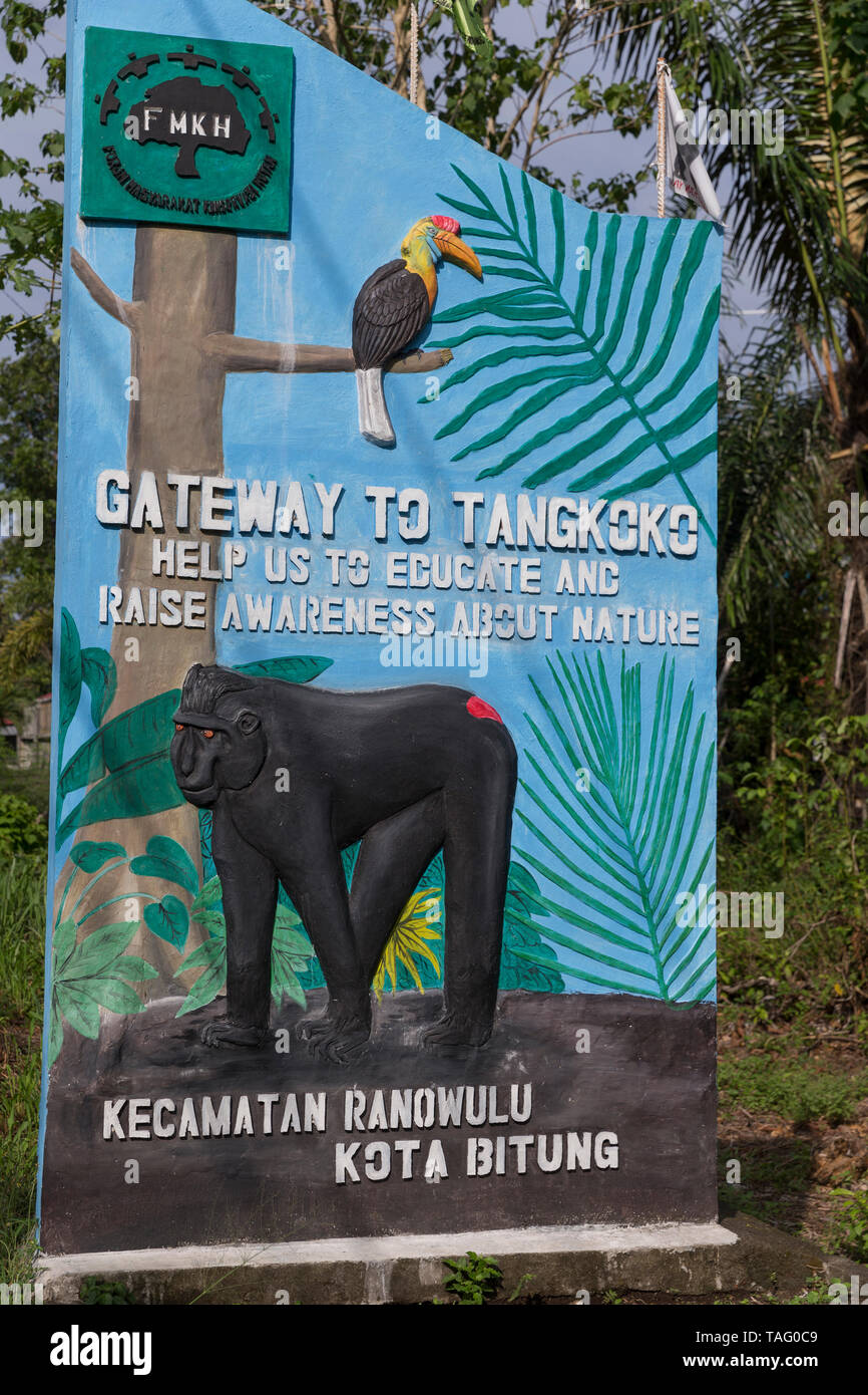 Tangkoko National Park, Sign at the entrance to the village of Tangkoko ...
