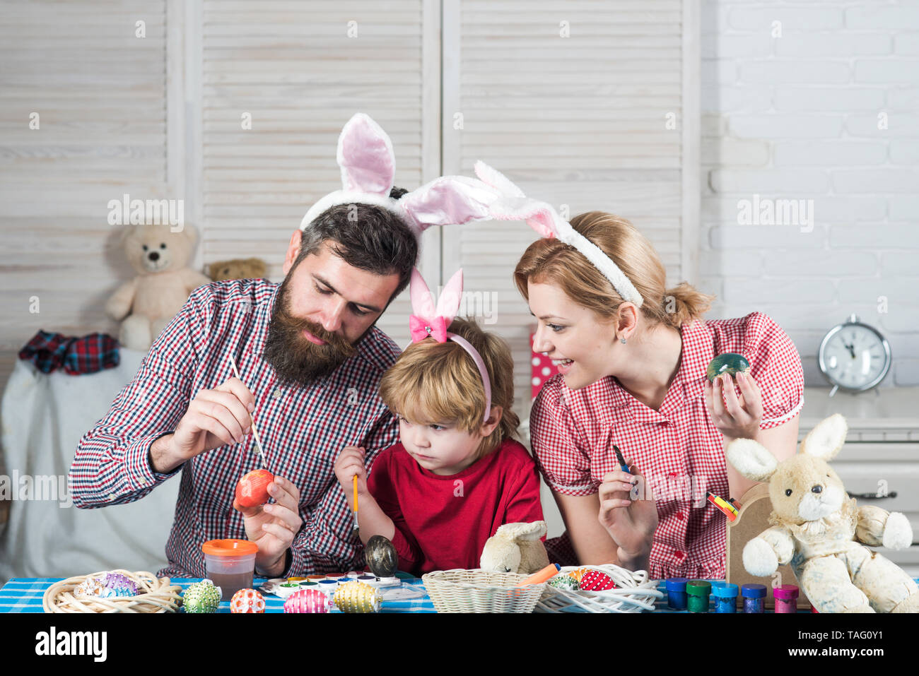 painting and drawing easter eggs with family. painting easter egg with ...