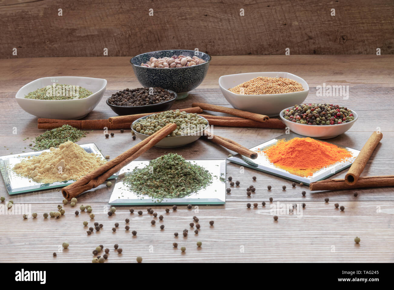 Spices background on wooden table - top view Stock Photo - Alamy