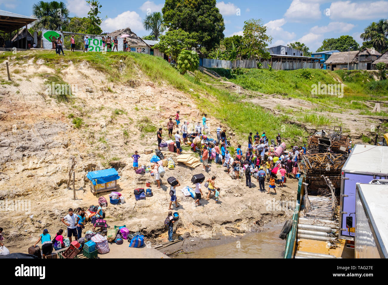 People boarding the ferry that covers the route Iquitos-Pucallpa at ...
