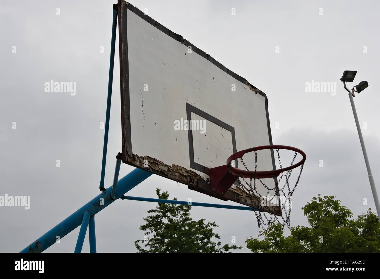 Old basketball board on the street court Stock Photo - Alamy