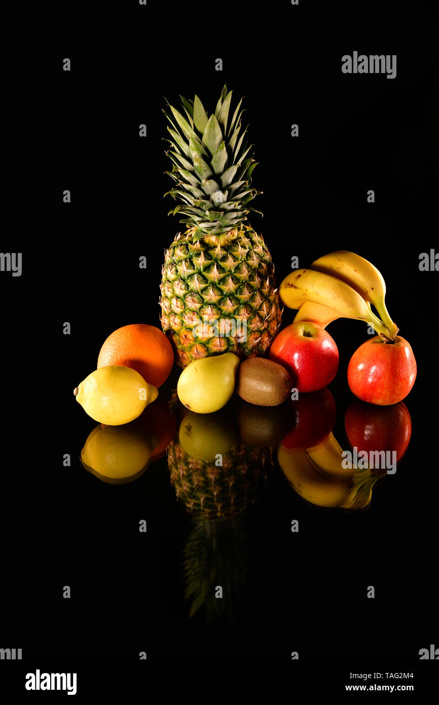 Fresh fruits reflect on black background. Isolated fruits Stock Photo ...