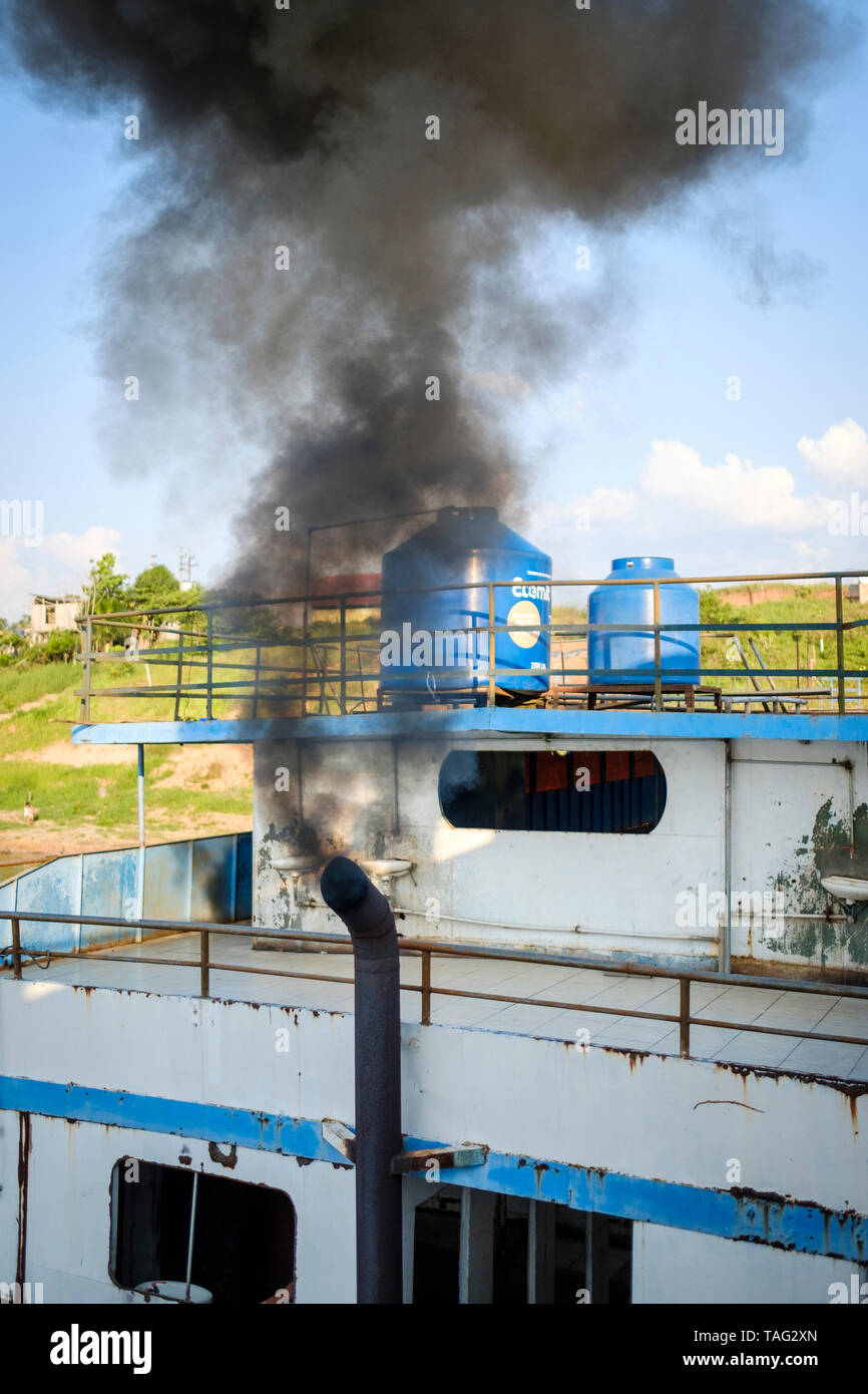 Black smoke coming form the diesel engine of the Ferry Men del Norte on ...