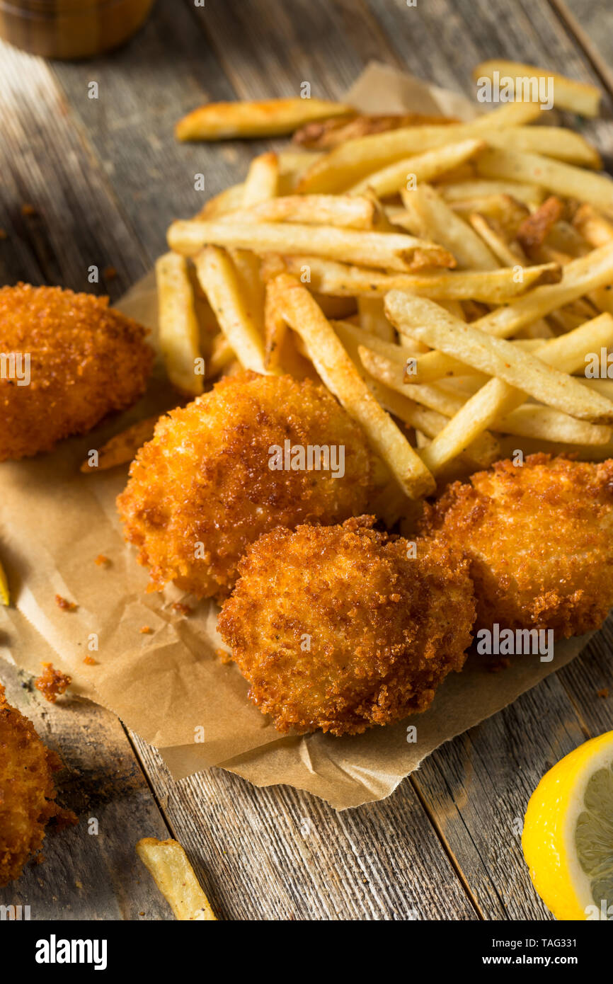 Homemade Deep Fried Scallops with French Fries Stock Photo - Alamy