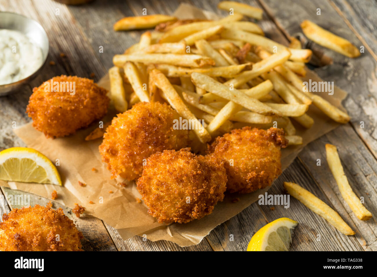 Homemade Deep Fried Scallops with French Fries Stock Photo - Alamy