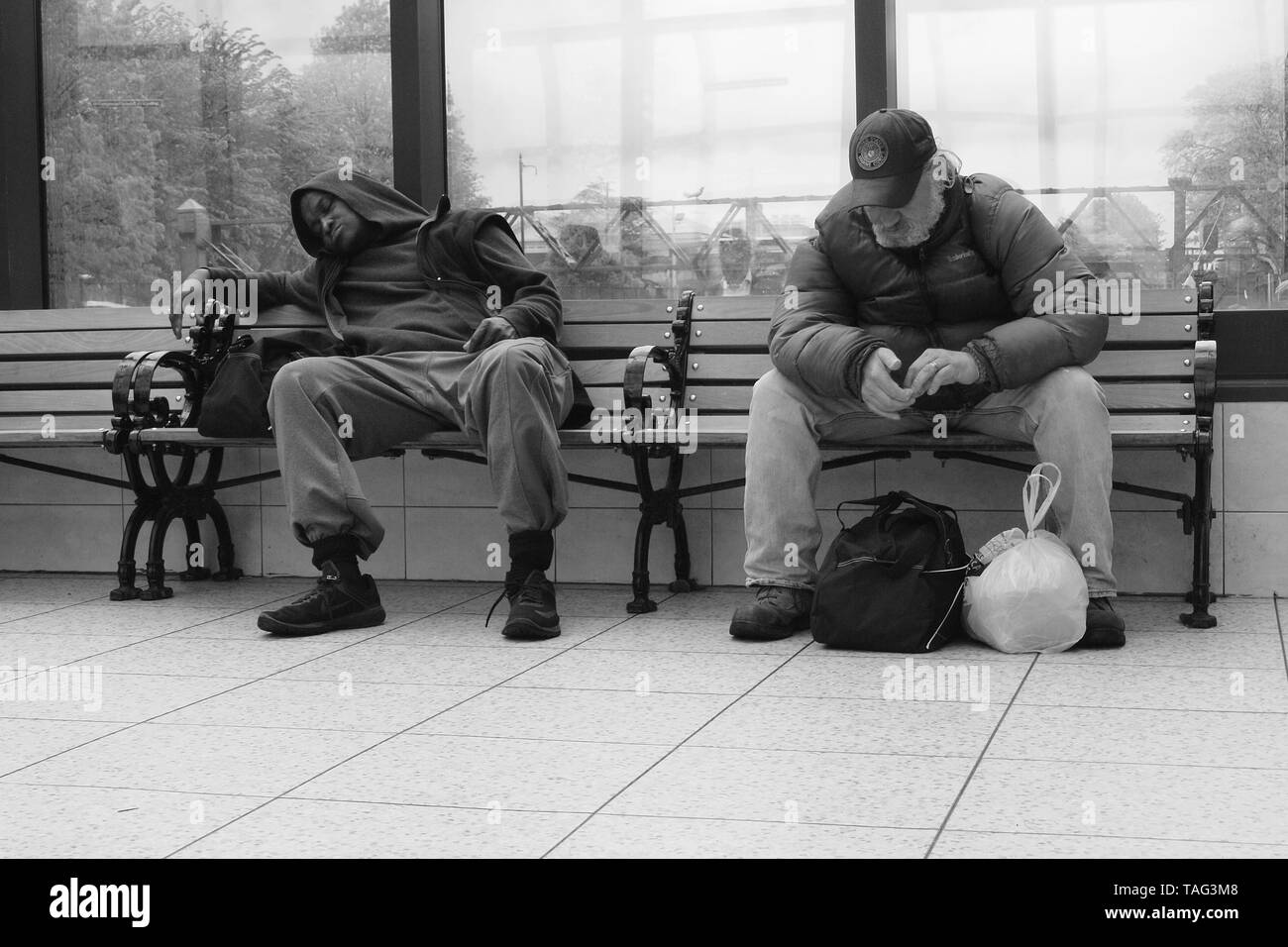 Two men sitting in train hi-res stock photography and images - Alamy