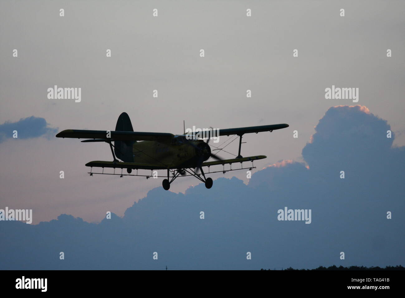 Antonv AN-2 biplane flying over the sky Stock Photo - Alamy