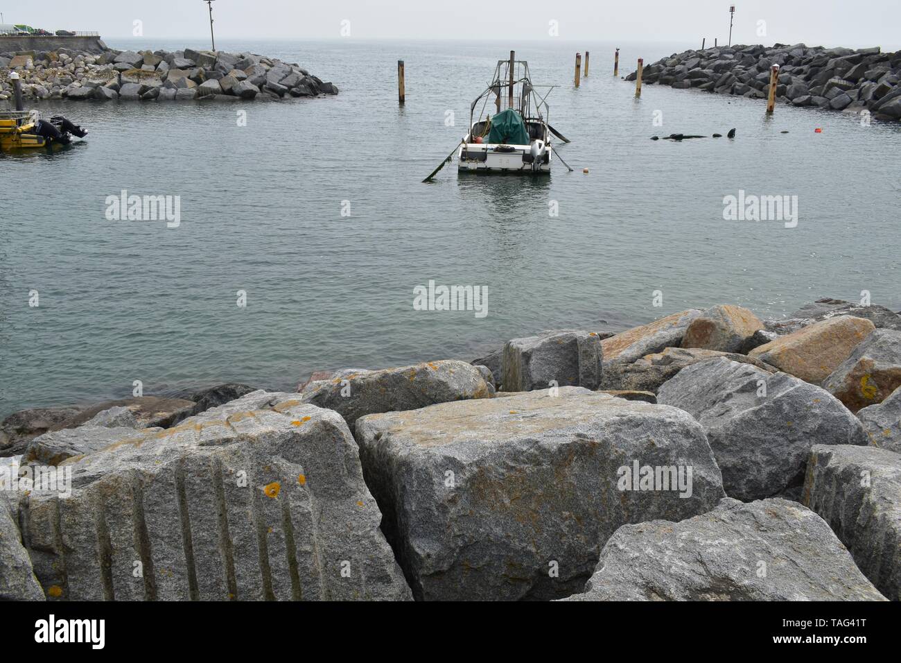 Fishing boat at anchor, in the small inlet bay at Ventnor, Isle of ...