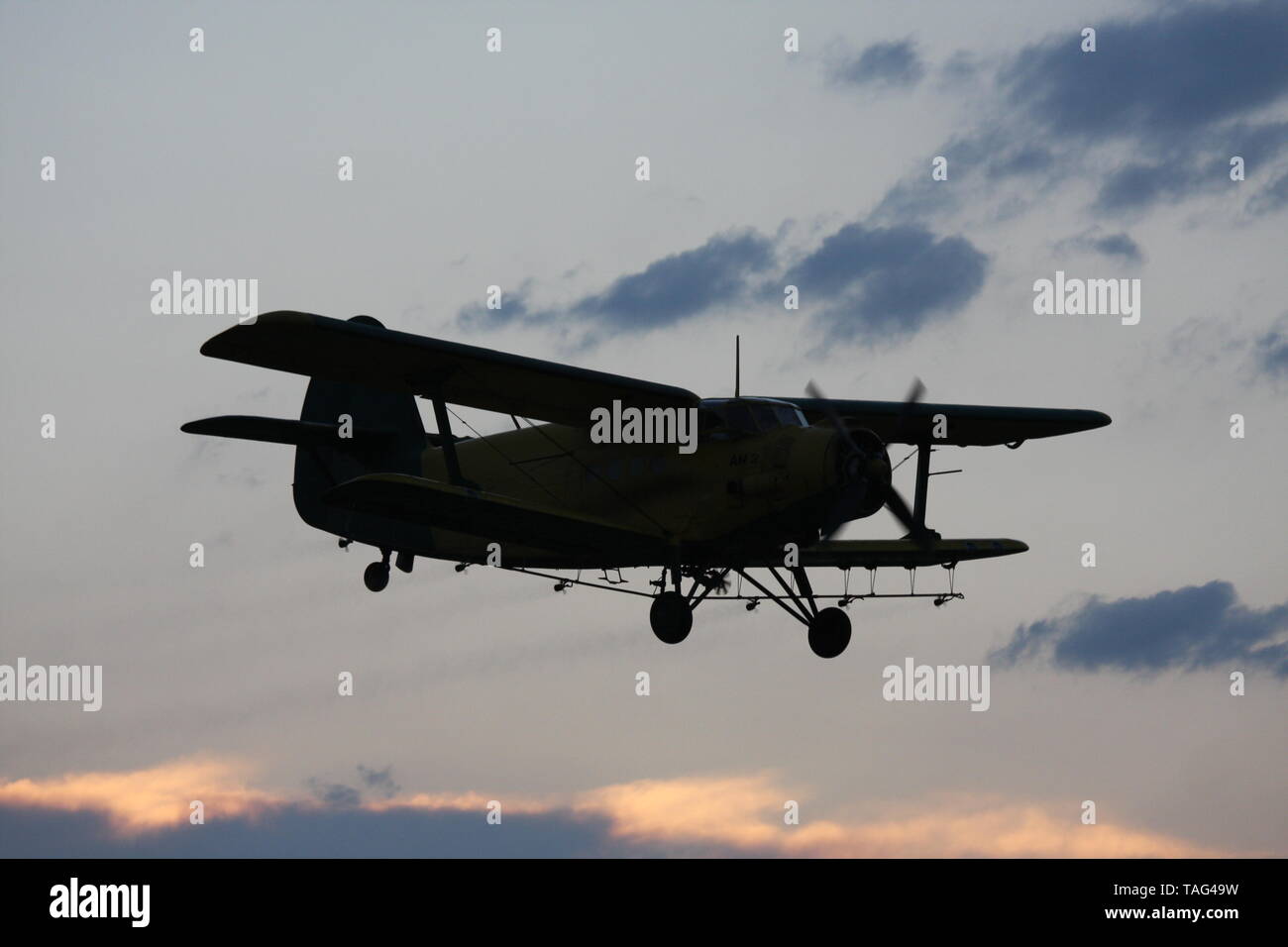 Antonv AN-2 biplane flying over the sky Stock Photo - Alamy