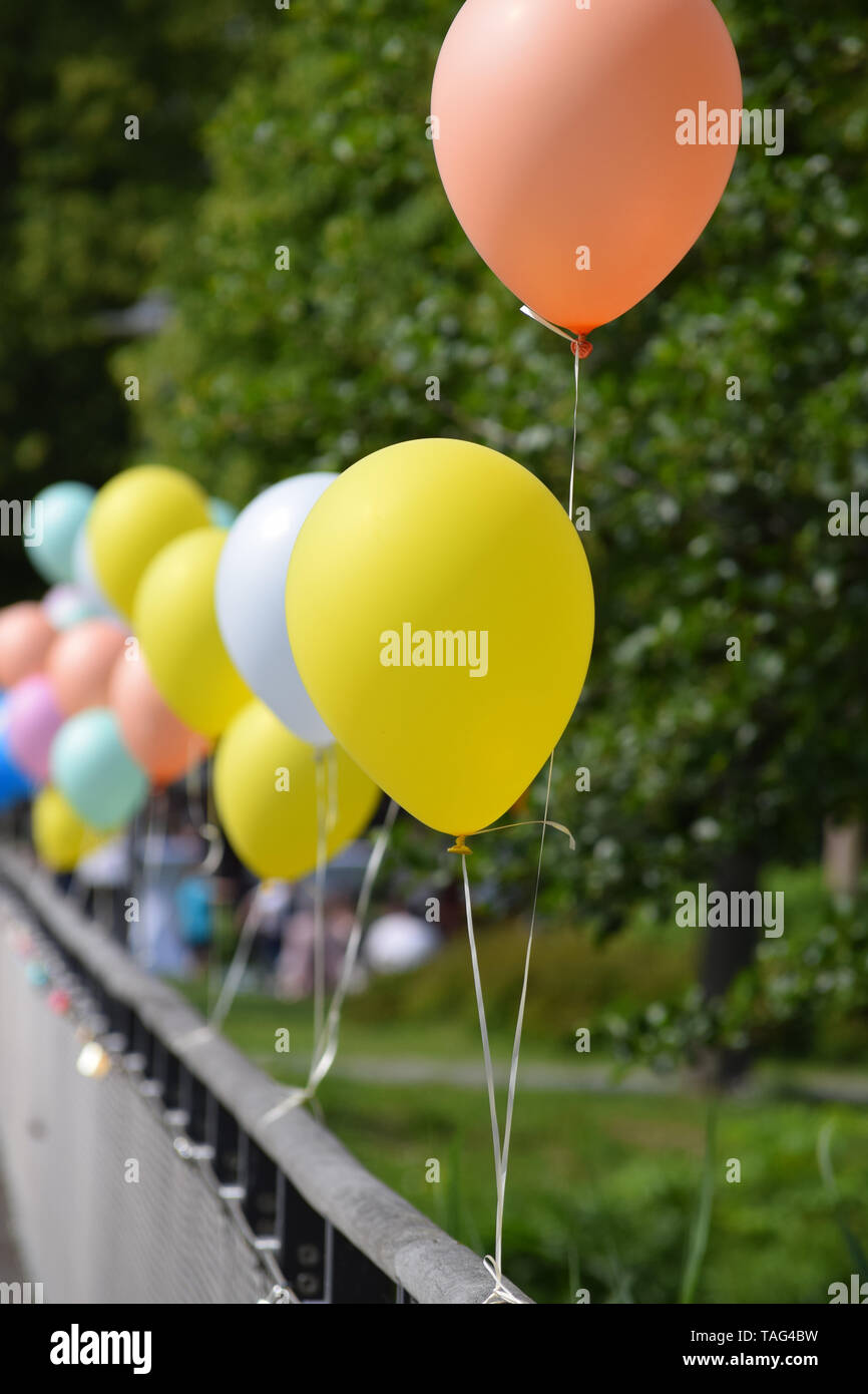 Balloons at the Bridge railing Stock Photo - Alamy