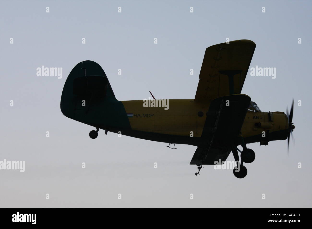 Antonv AN-2 biplane flying over the sky Stock Photo - Alamy